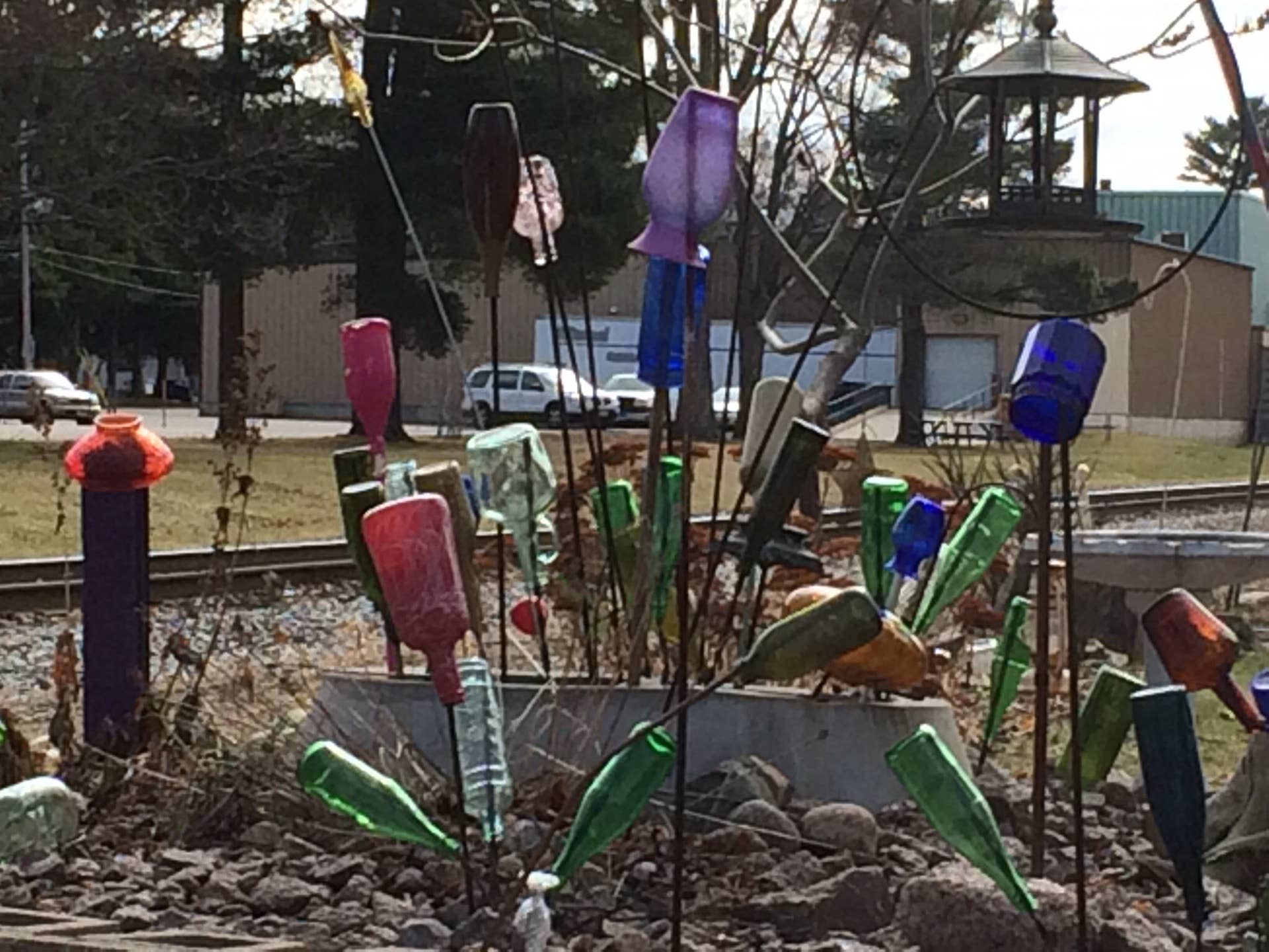 How to Make a Bottle Tree for Your Garden - Dengarden