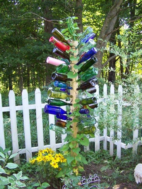 How to Make a Bottle Tree for Your Garden - Dengarden