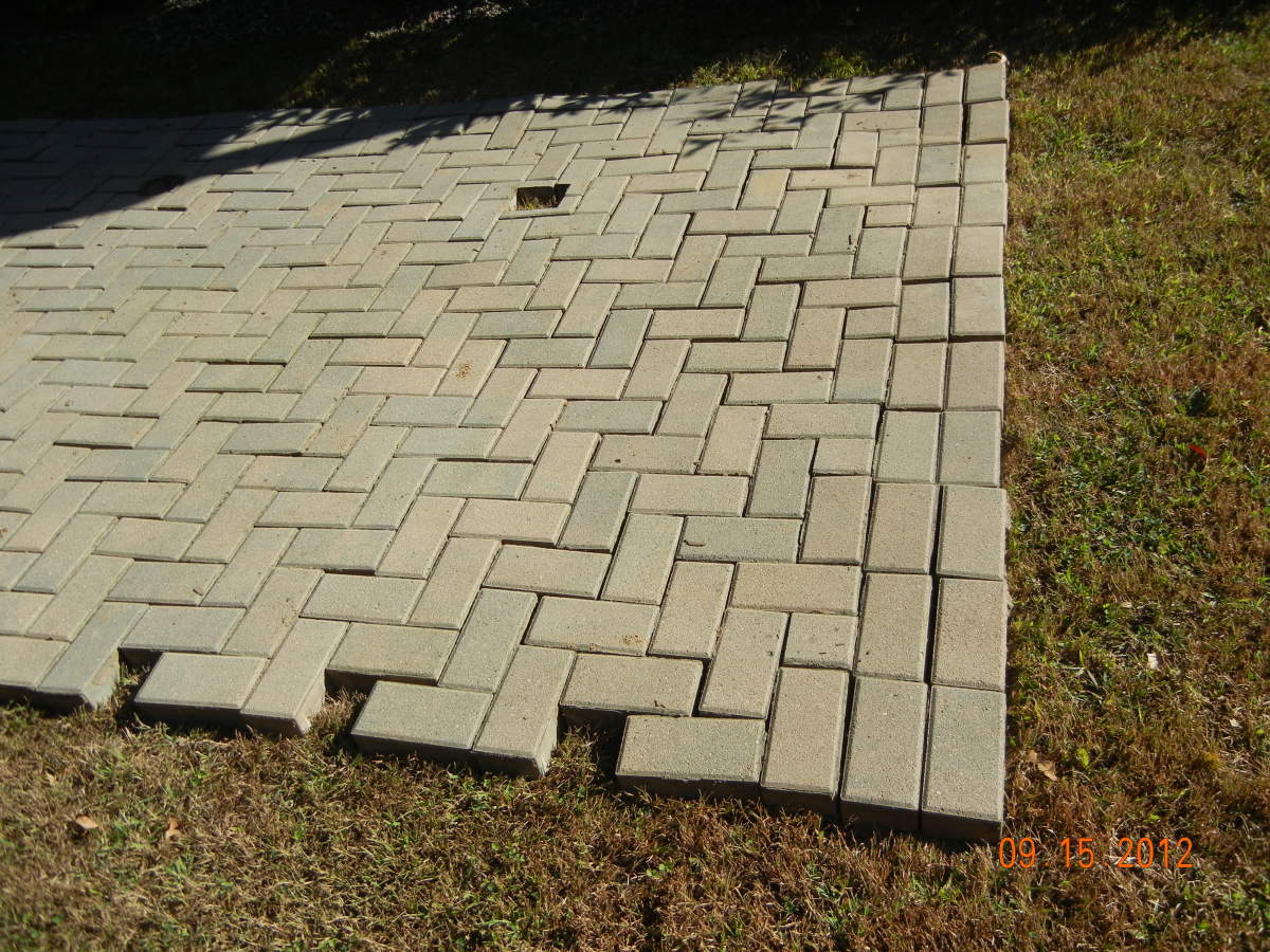 How to Lay Pavers for a Patio: Fixing a Brick Patio Yourself - Dengarden