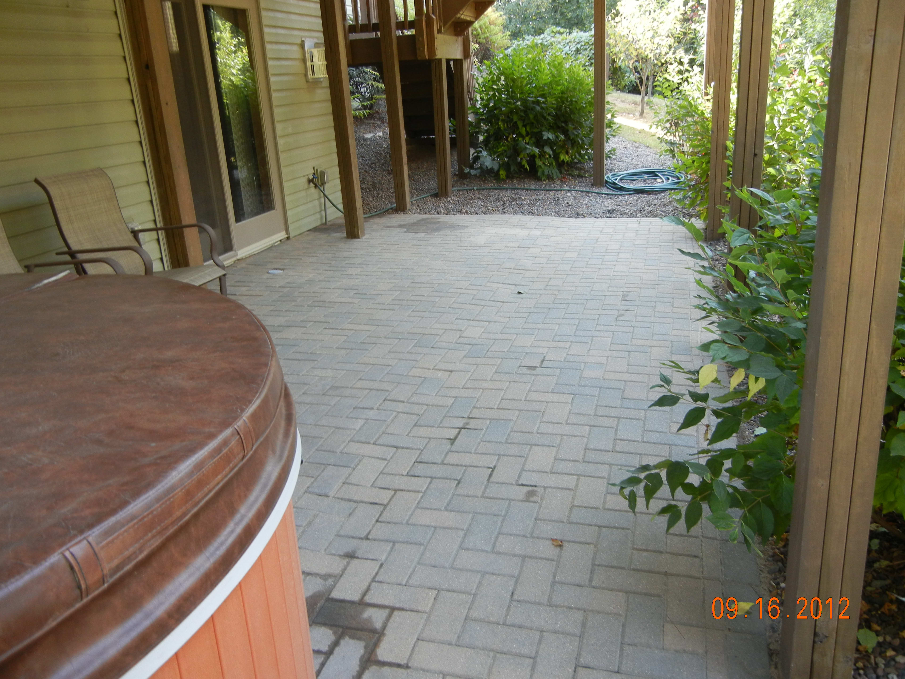 How to Lay Pavers for a Patio: Fixing a Brick Patio Yourself - Dengarden