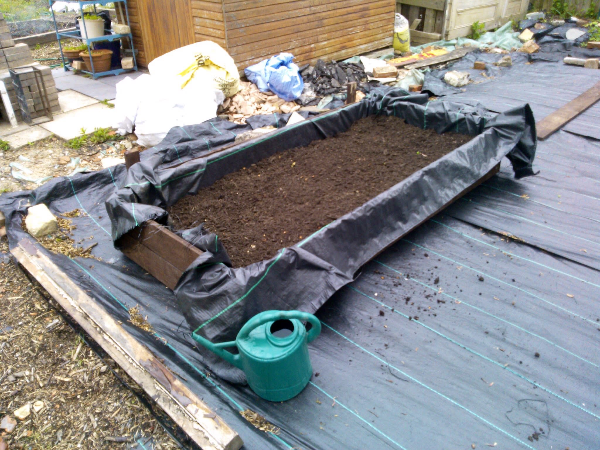 How to Build Raised Beds and Keep a Weed-Free, Low-Maintenance ...