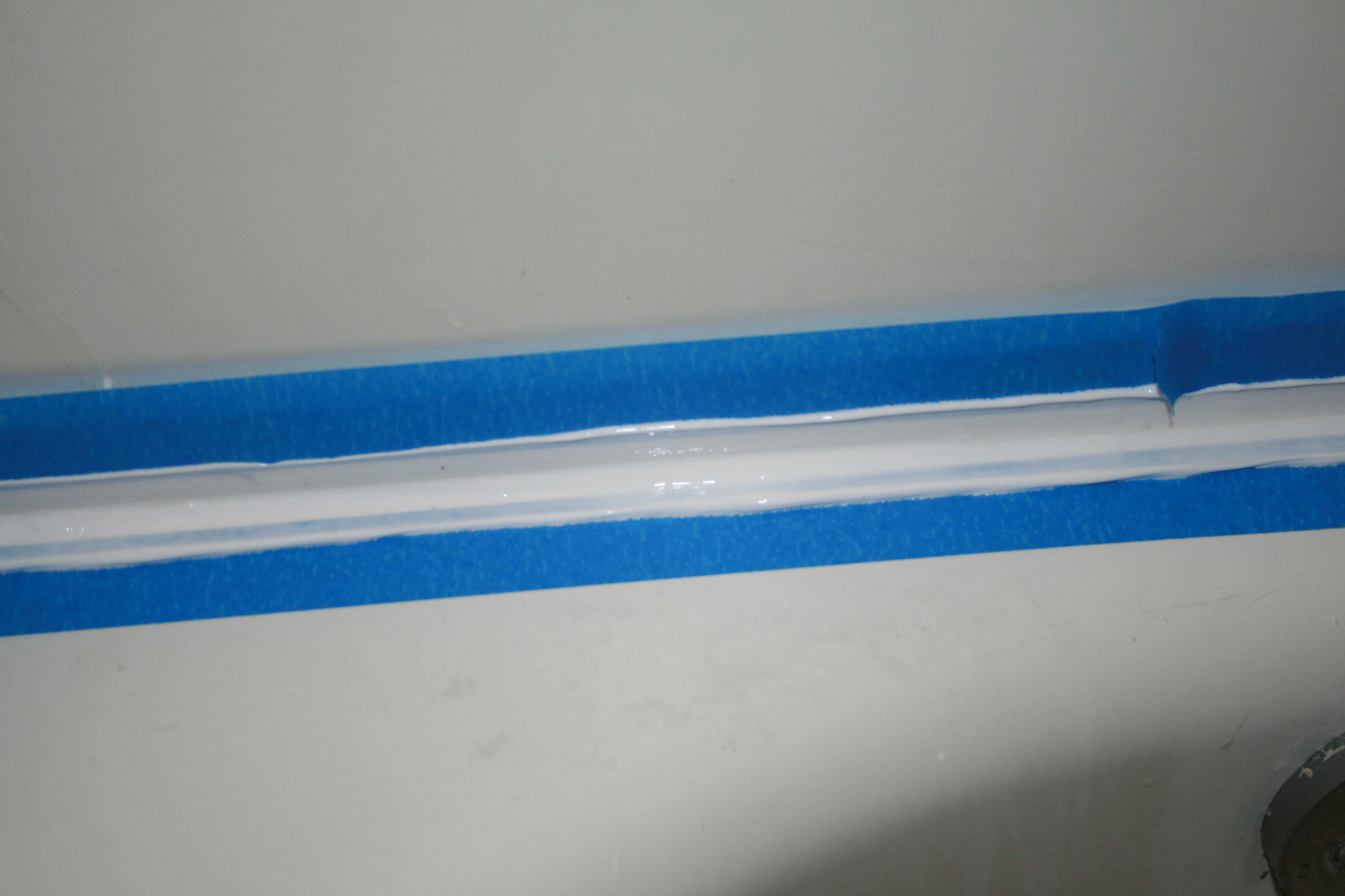 A Beginner’s Guide to Caulking a Bathtub - Dengarden