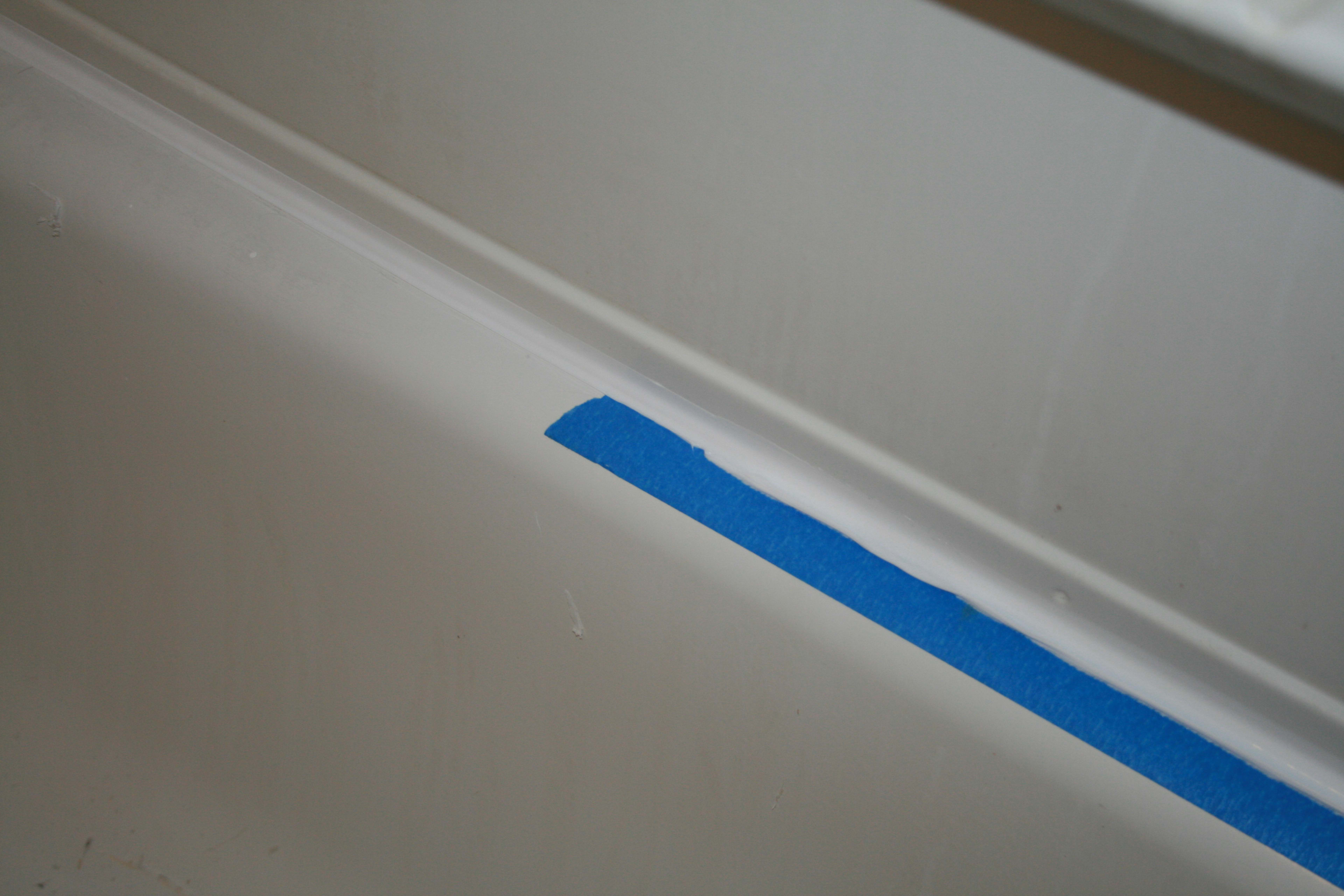 A Beginner’s Guide to Caulking a Bathtub - Dengarden