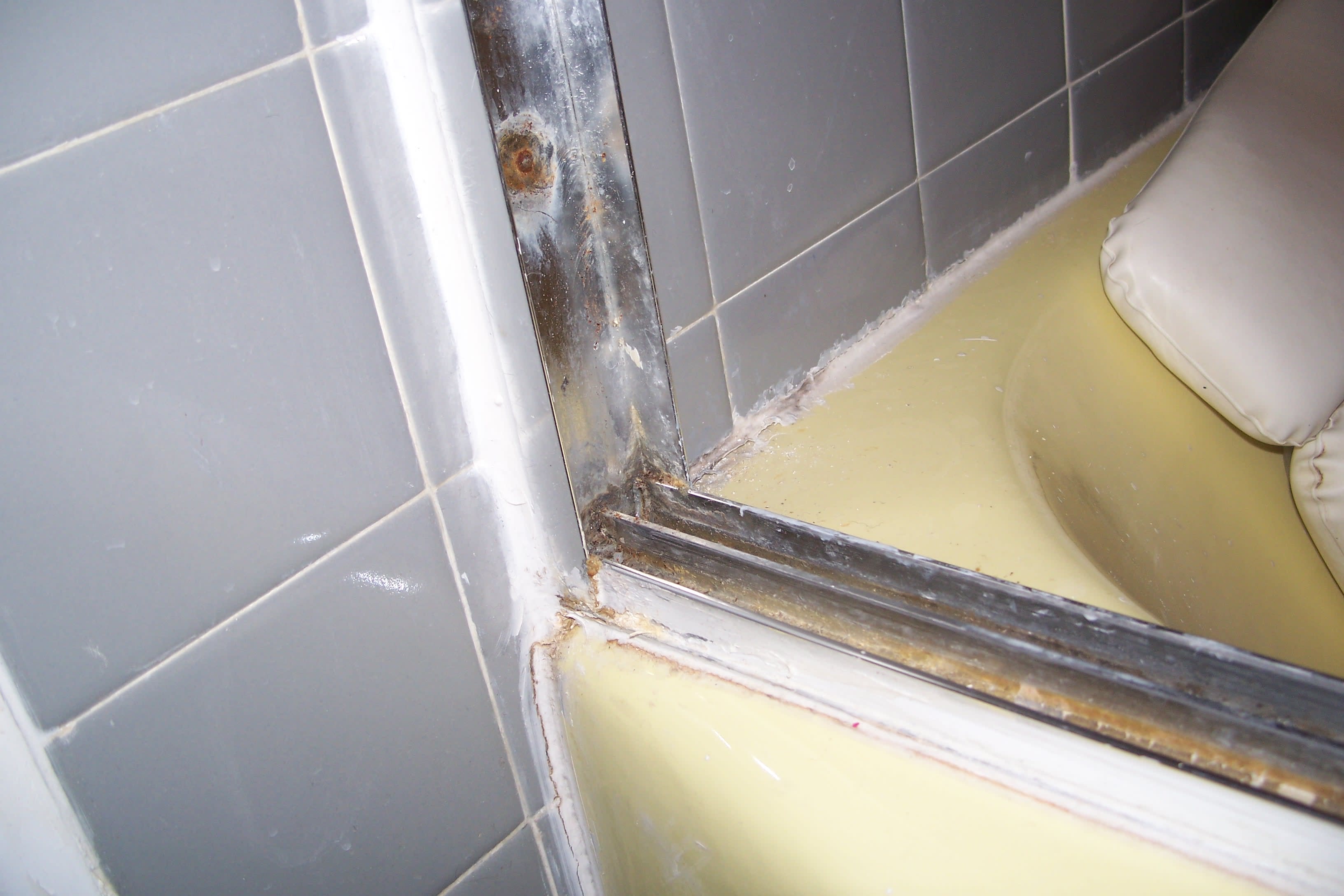 DIY Guide to Remove Shower Doors From a Bathtub - Dengarden
