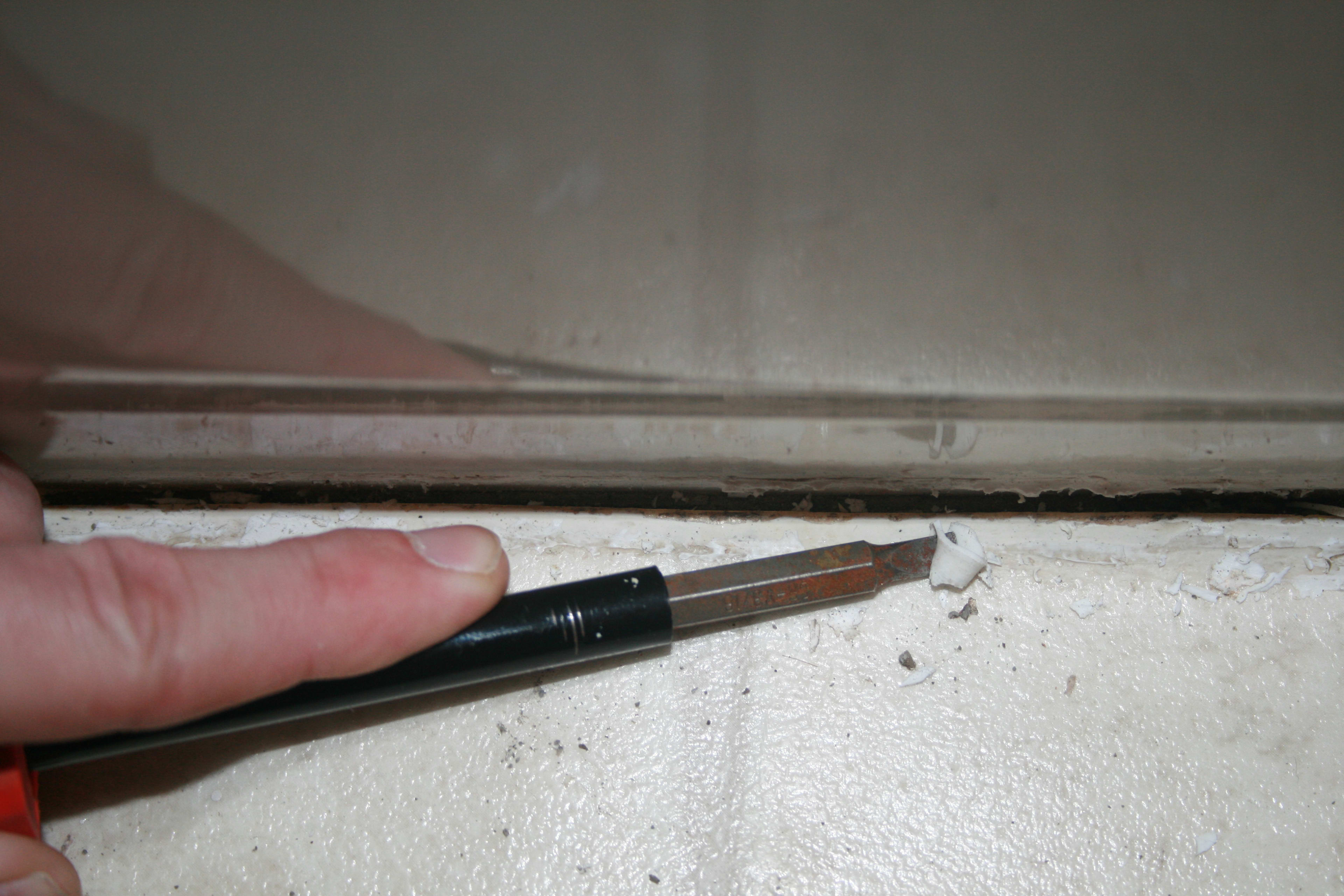 Remove excess dried caulk store