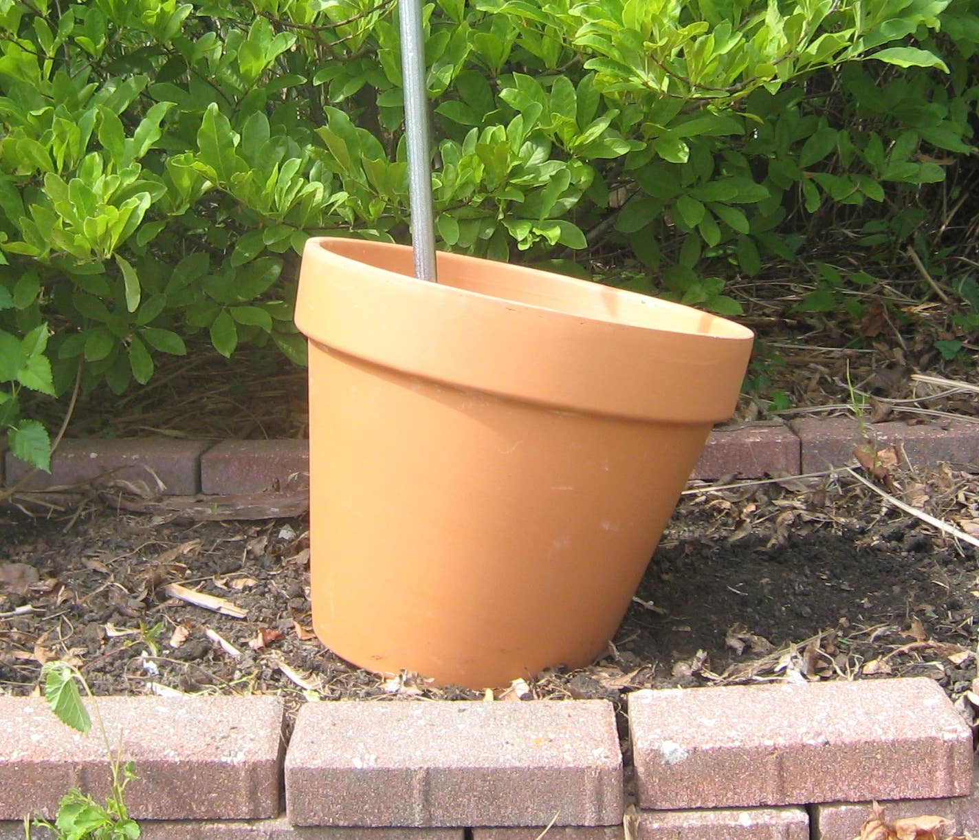 How to Make a Crooked Terra Cotta Pot Flower Tower With Annuals - Dengarden