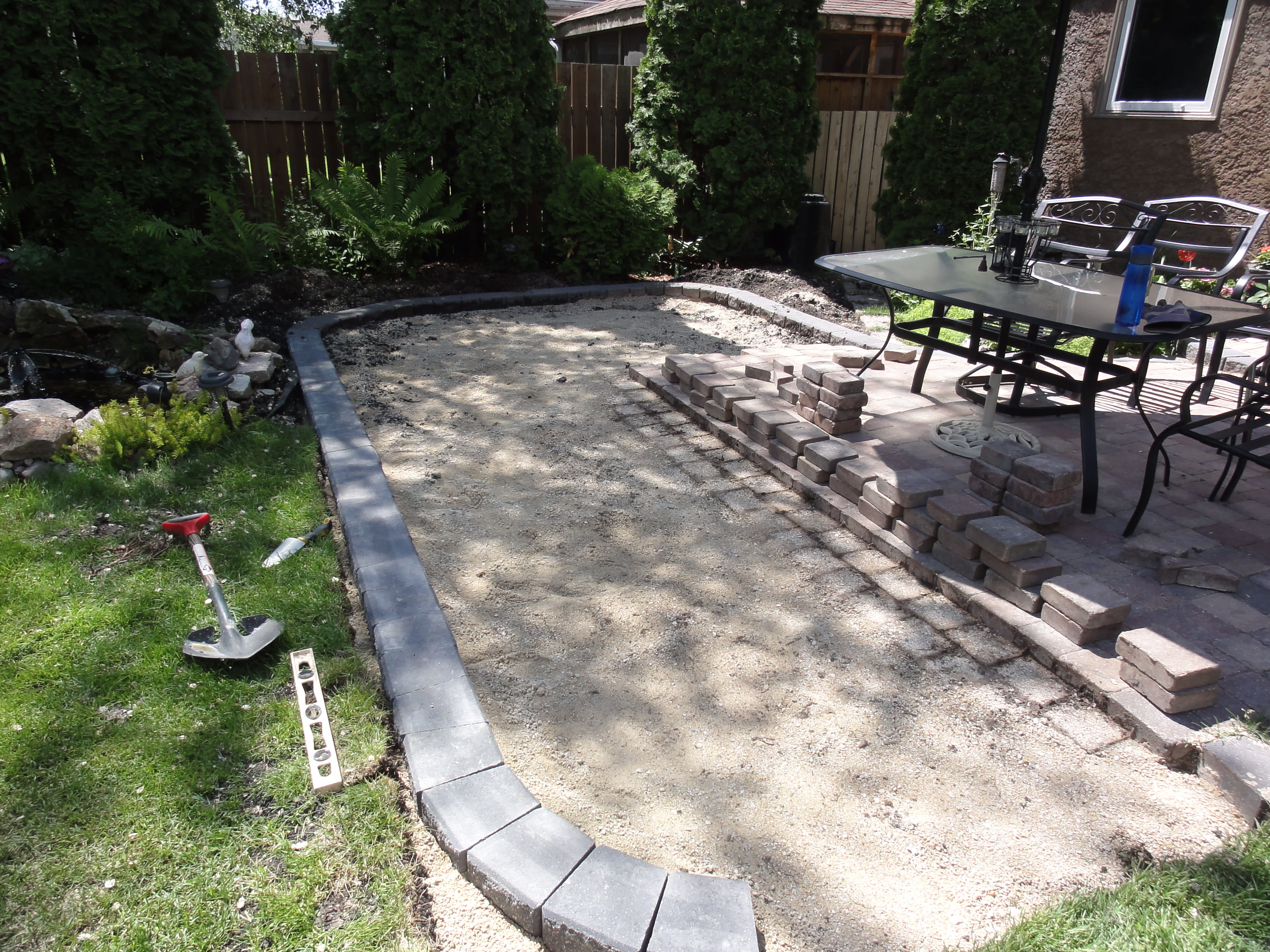 How to Build a Patio With Paving Stones - Dengarden