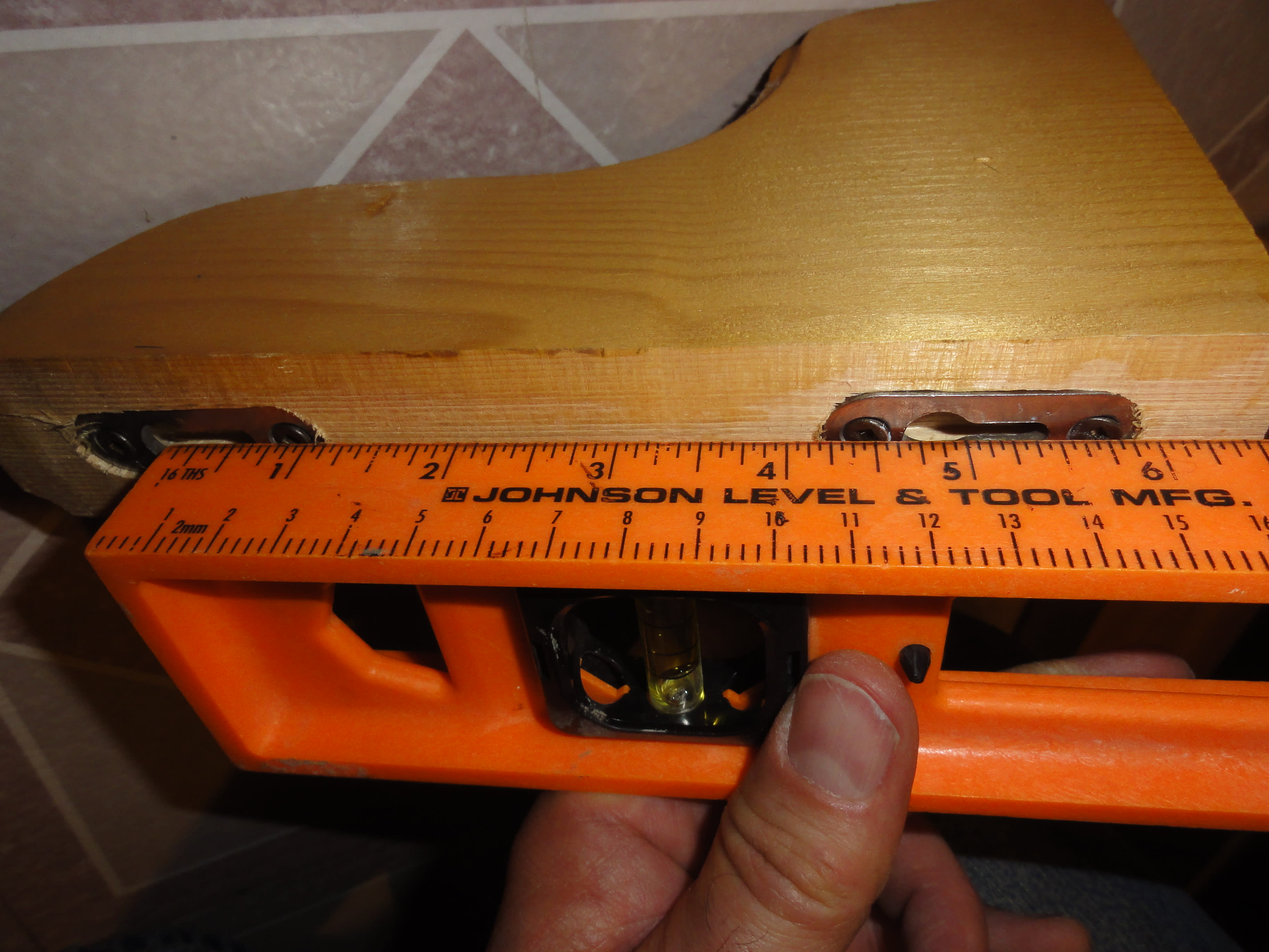 How to Measure and Install a Wooden Shelf With Brackets - Dengarden