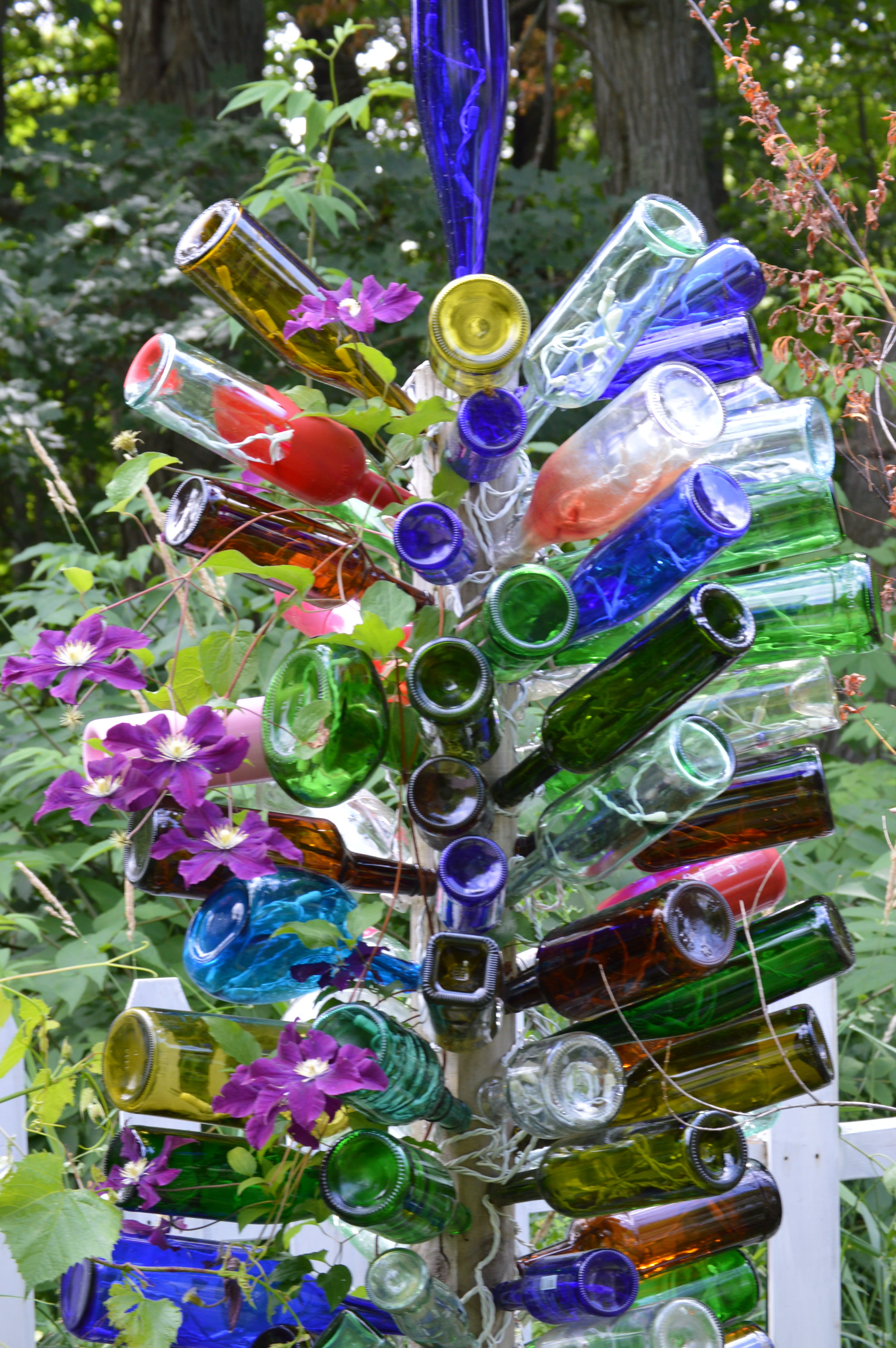 How to Make a Bottle Tree for Your Garden - Dengarden